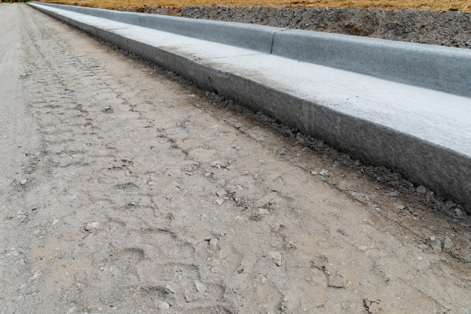 Commercial Concrete Curbs & Gutters - Evolve Concrete Construction